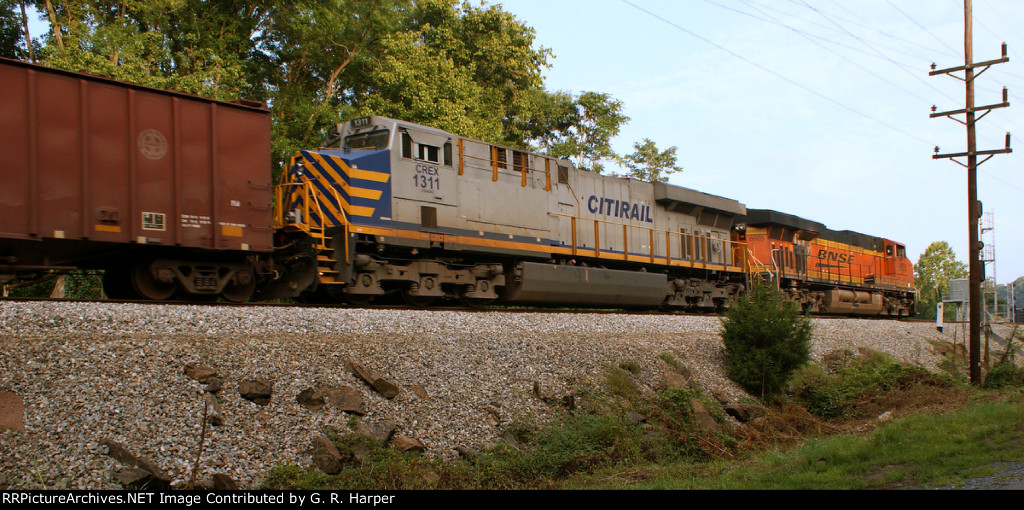 CREX 1311 trail oil train K08015 at the west end of Reusens